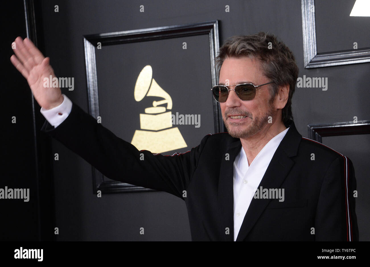 Composer Jean-Michel Jarre arrives for the 59th annual Grammy Awards ...
