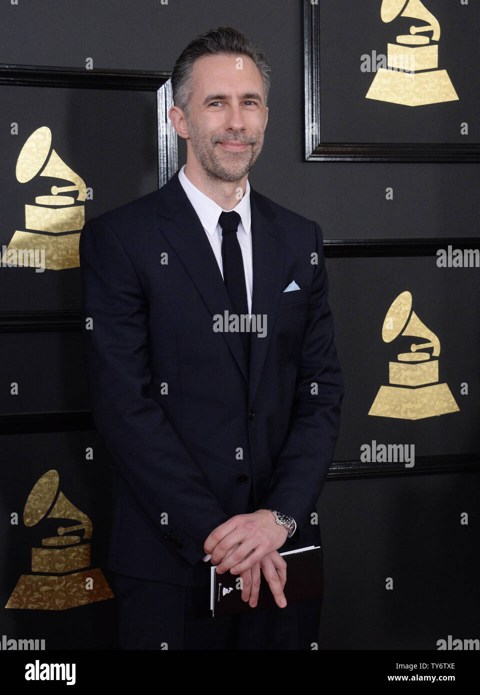 Producer Sam Dixon arrives for the 59th annual Grammy Awards held at ...