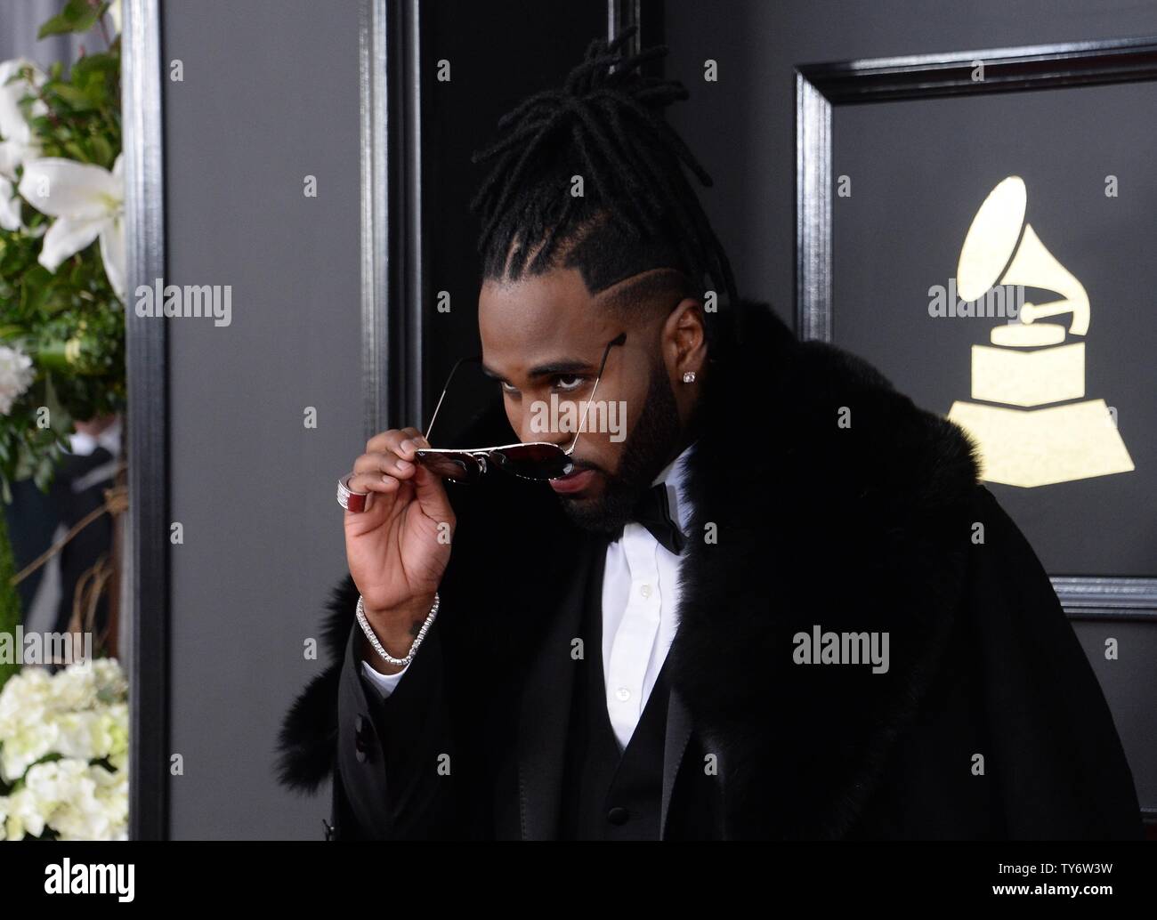 Singer The Weeknd arrives for the 59th annual Grammy Awards held at ...