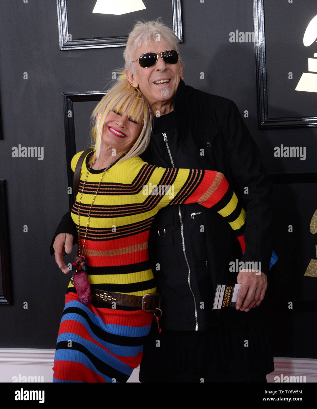 (L-R) Designer Betsey Johnson and musician John Cale arrive for the ...
