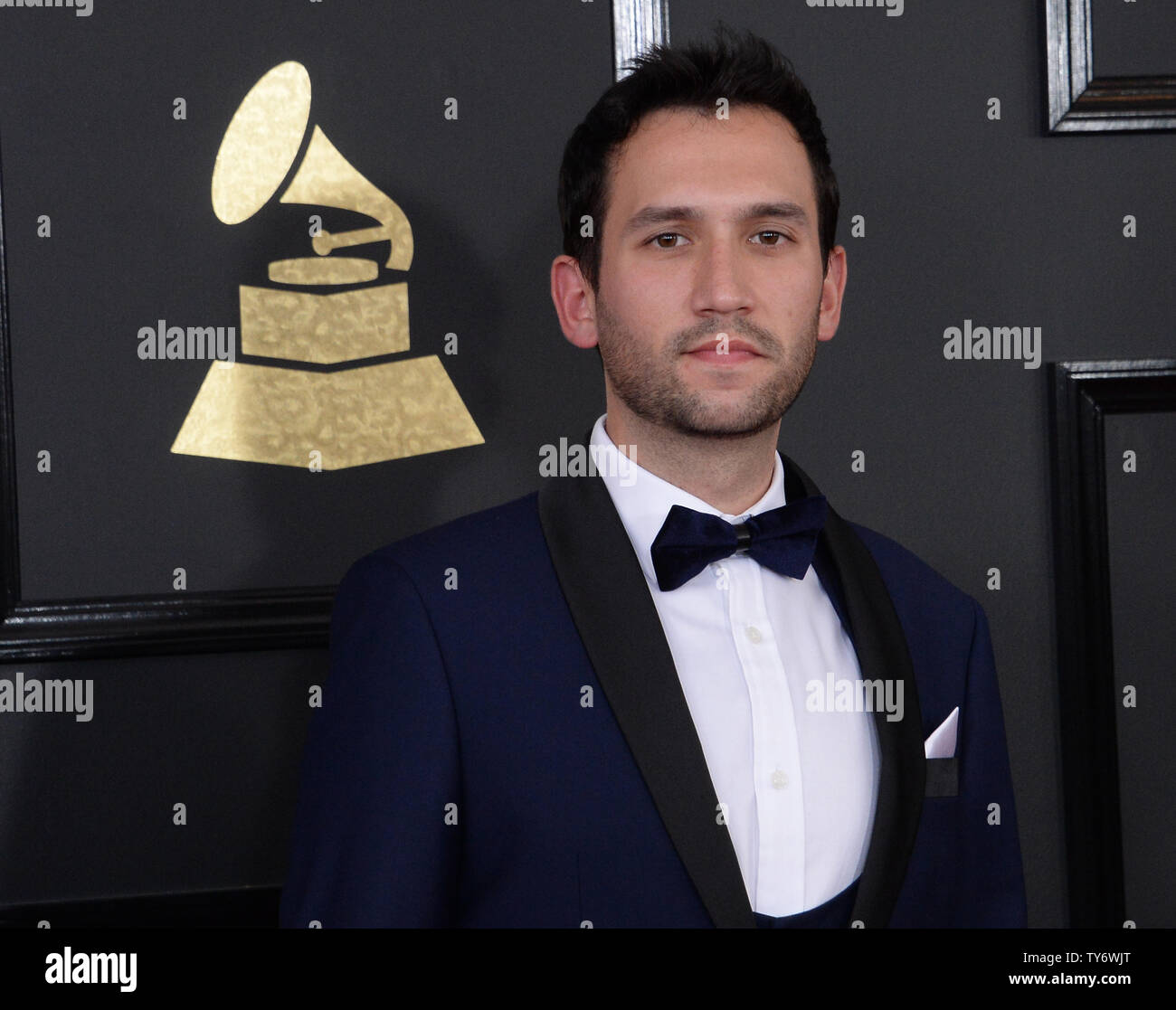 Recording engineer Bryan Wilson arrives for the 59th annual Grammy ...