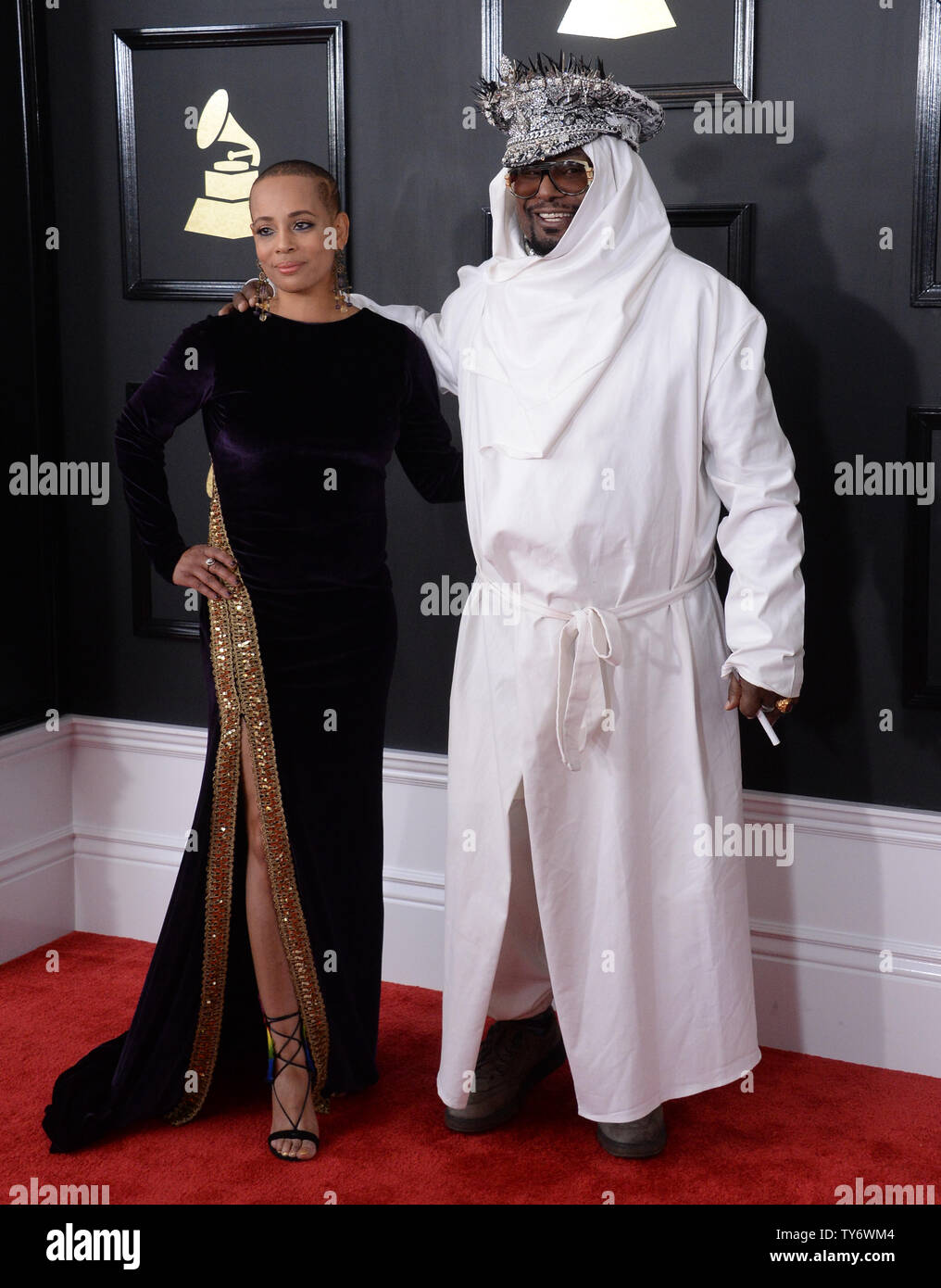 Carlon Thompson-Clinton (L) and musician George Clinton arrive for the ...