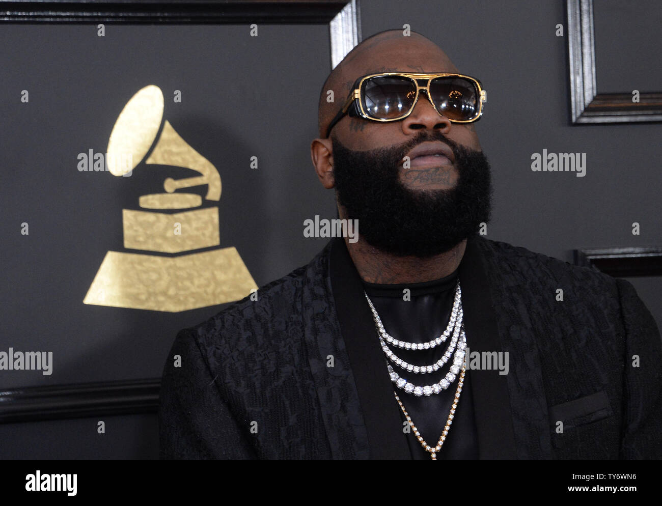 Rapper Rick Ross arrives for the 59th annual Grammy Awards held at ...
