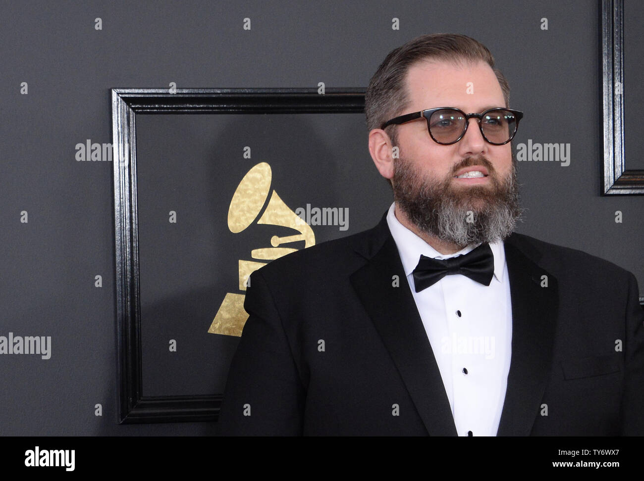 Songwriter busbee arrives for the 59th annual Grammy Awards held at ...