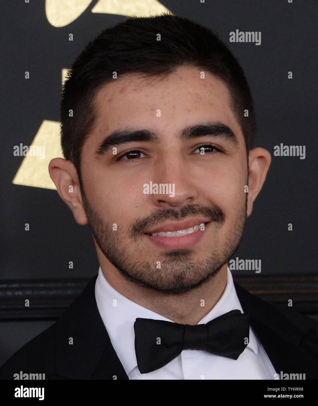 Composer Joss Favela arrives for the 59th annual Grammy Awards held at ...