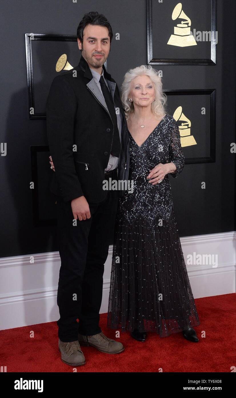 (L-R) Singer/songwriters Ari Hest and Judy Collins arrive for the 59th ...