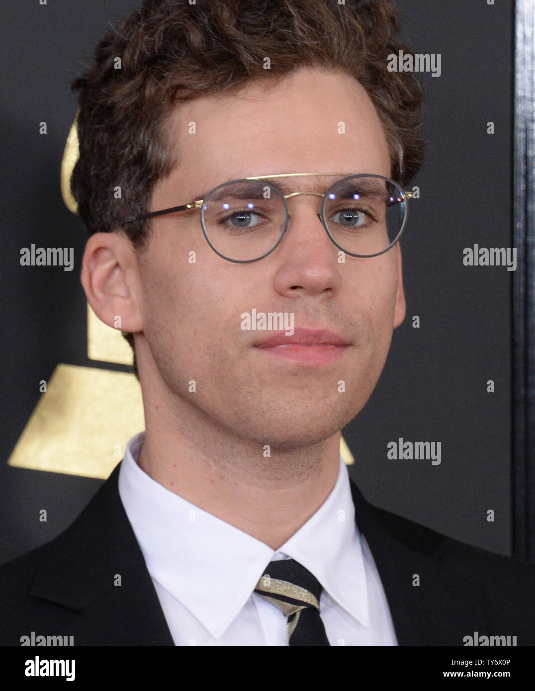 TV personality Andrew Savage arrives for the 59th annual Grammy Awards ...