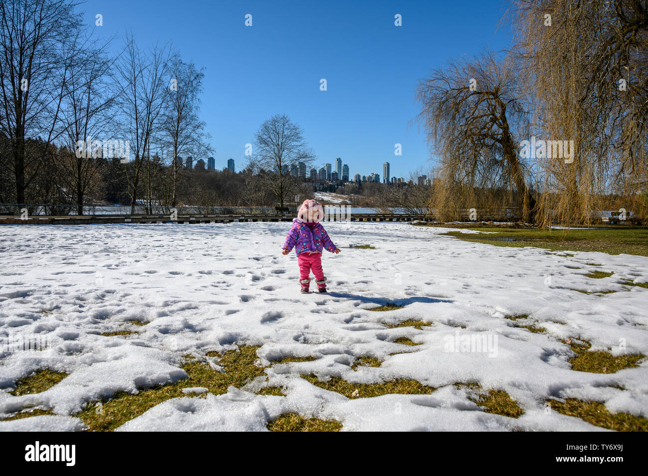 20 months old baby enjoying the nice weather outside. Toddler girl ...