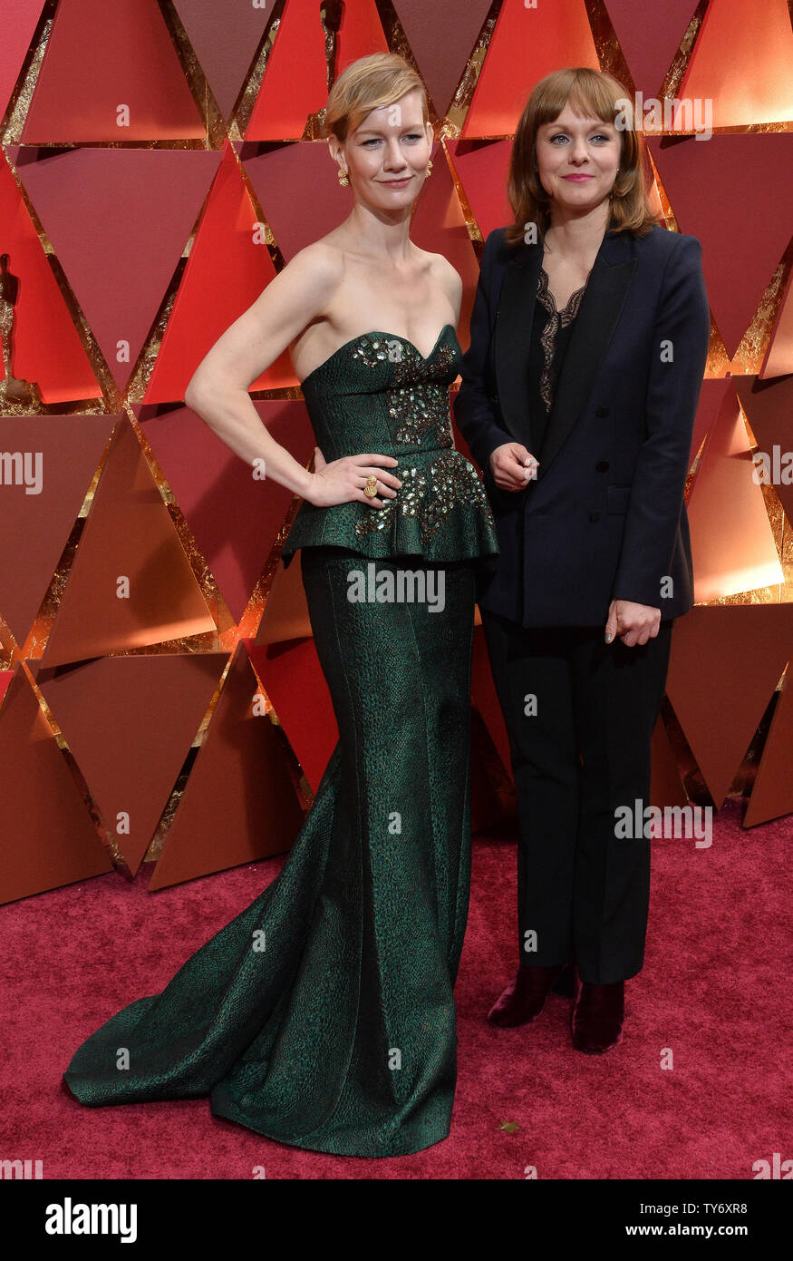 Sandra Huller and Maren Ade arrive on the red carpet for the 89th ...