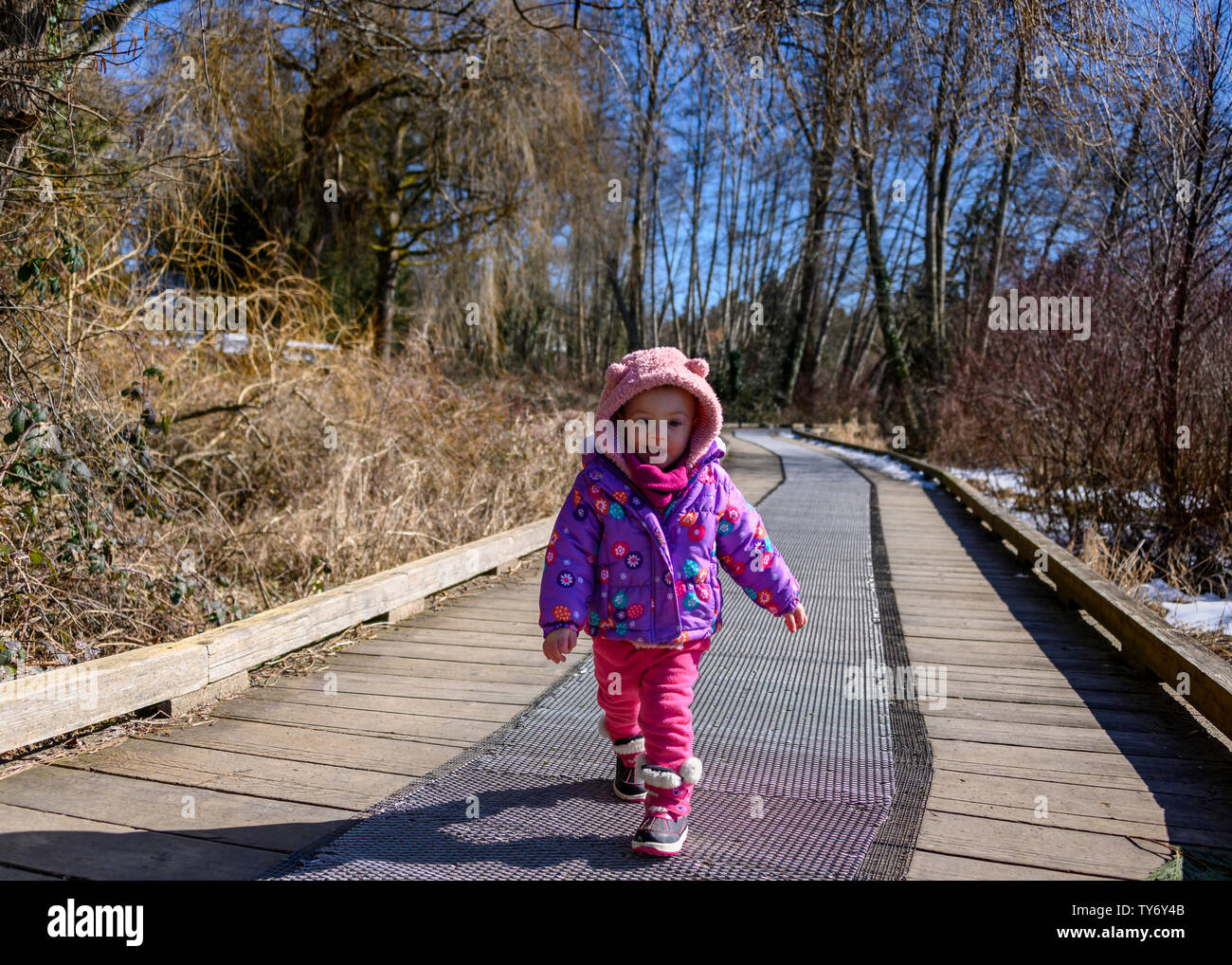20 months old baby enjoying the nice weather outside. Toddler girl ...