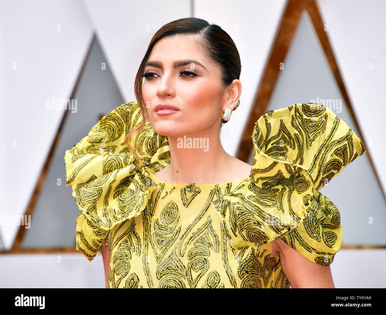 Actress Bianca Blanco arrives with an assortment of Oscar-themed food ...