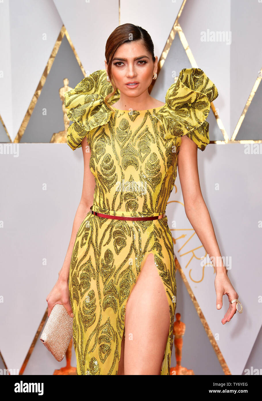 Actress Bianca Blanco arrives with an assortment of Oscar-themed food ...