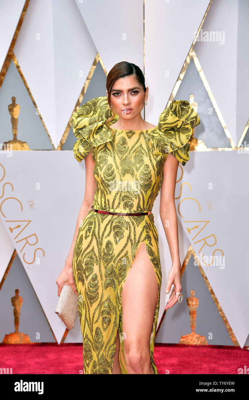 Actress Bianca Blanco arrives with an assortment of Oscar-themed food ...