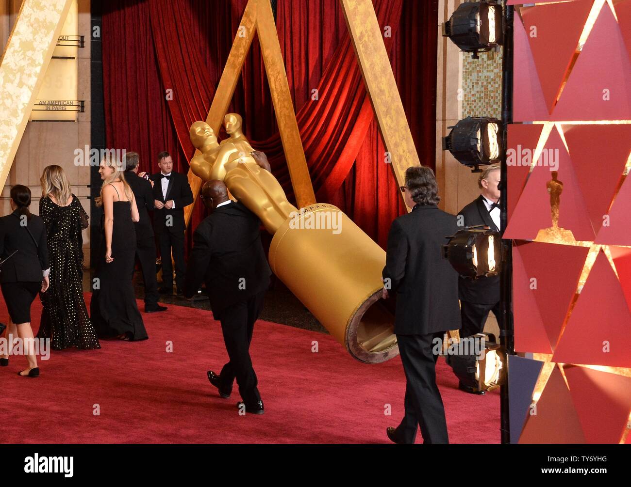 An Oscar statue arrives on the red carpet for the 89th annual Academy ...