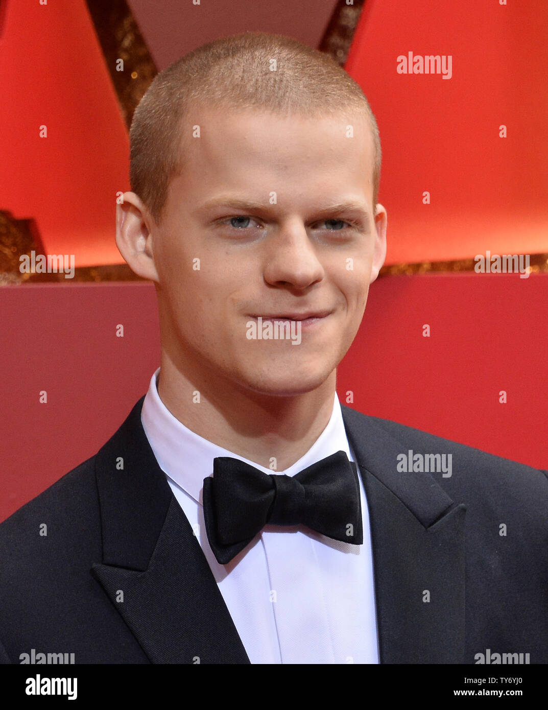 Actor Lucas Hedges arrives on the red carpet for the 89th annual ...