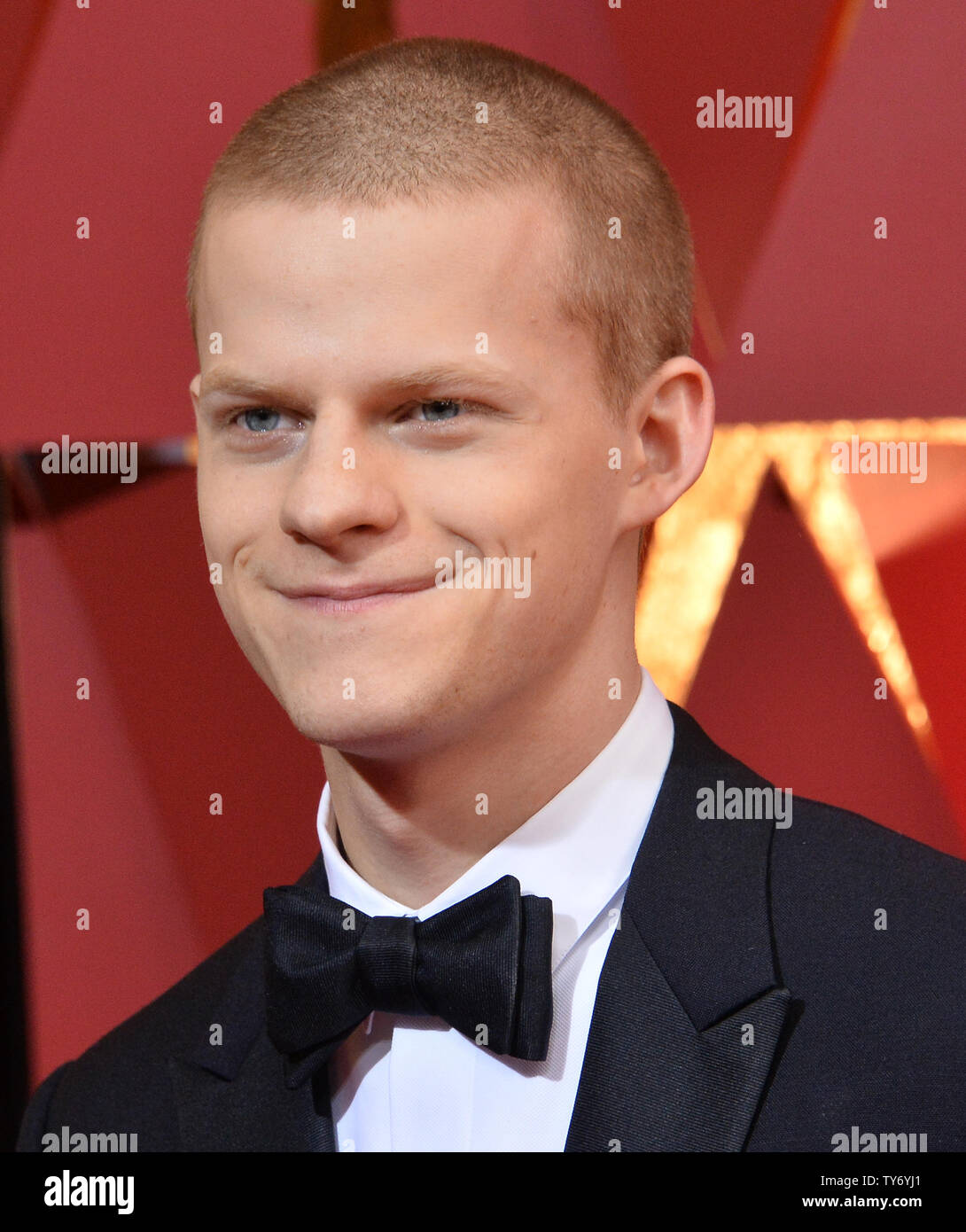 Actor Lucas Hedges arrives on the red carpet for the 89th annual ...