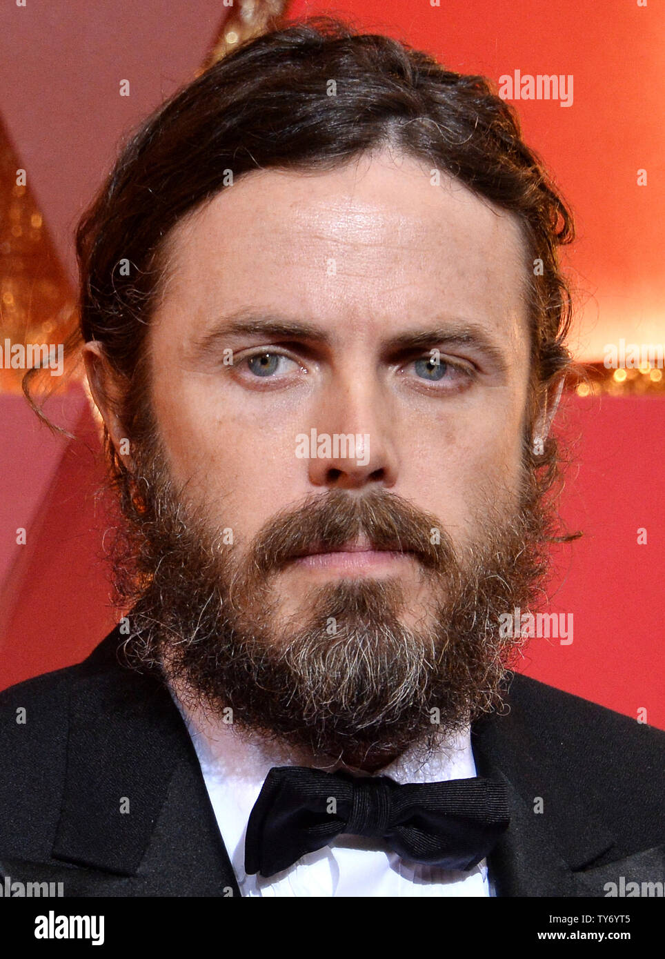 Actor Casey Affleck arrives on the red carpet for the 89th annual ...