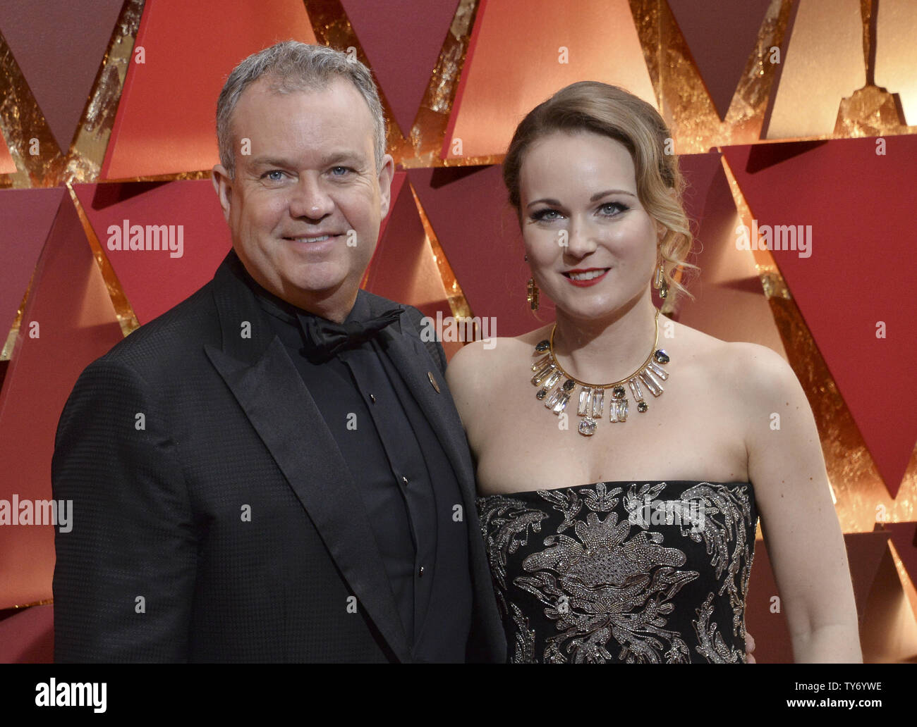 Visual effects artist Neil Corbould (L) and guest arrive on the red ...
