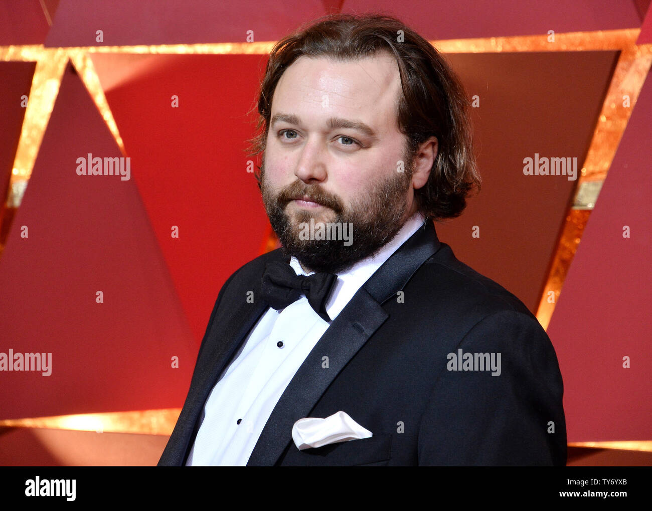 Film editor Jake Roberts arrives on the red carpet for the 89th annual ...