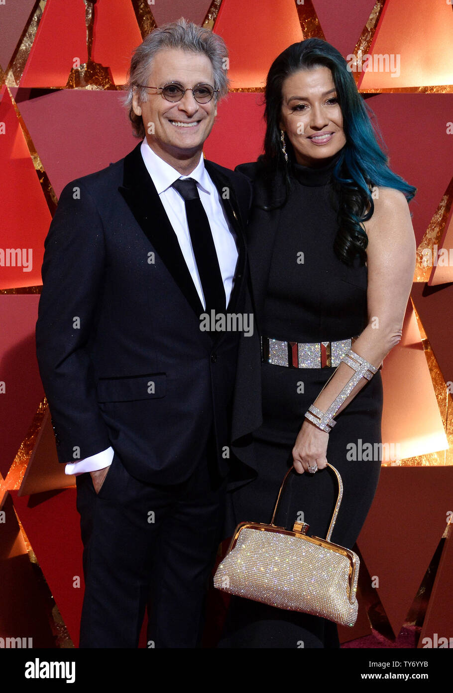 Sound editor Mark Mangini (L) and Ann Mangini arrive on the red carpet ...