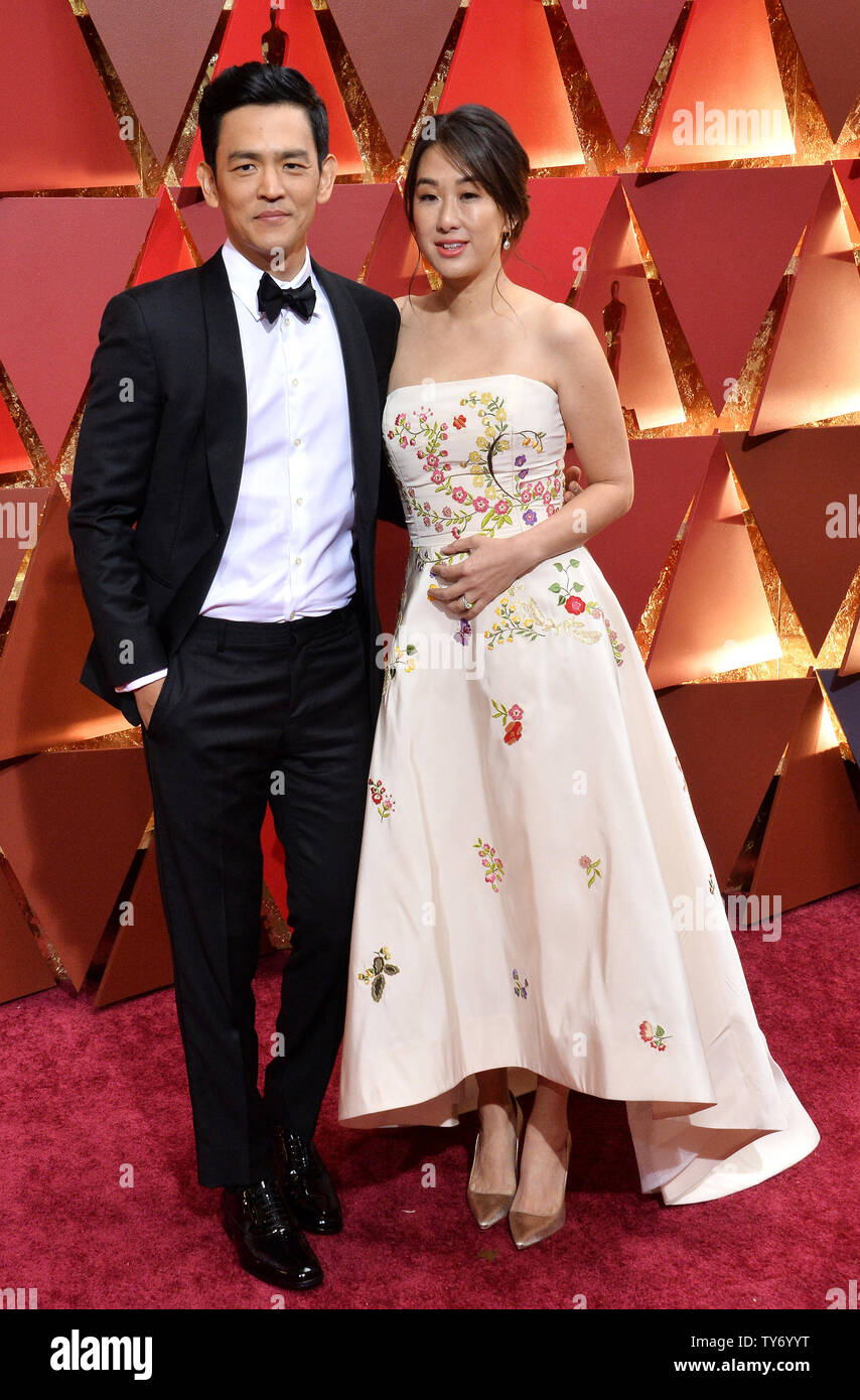 Actor John Cho (L) and Kerri Higuchi arrive on the red carpet for the ...