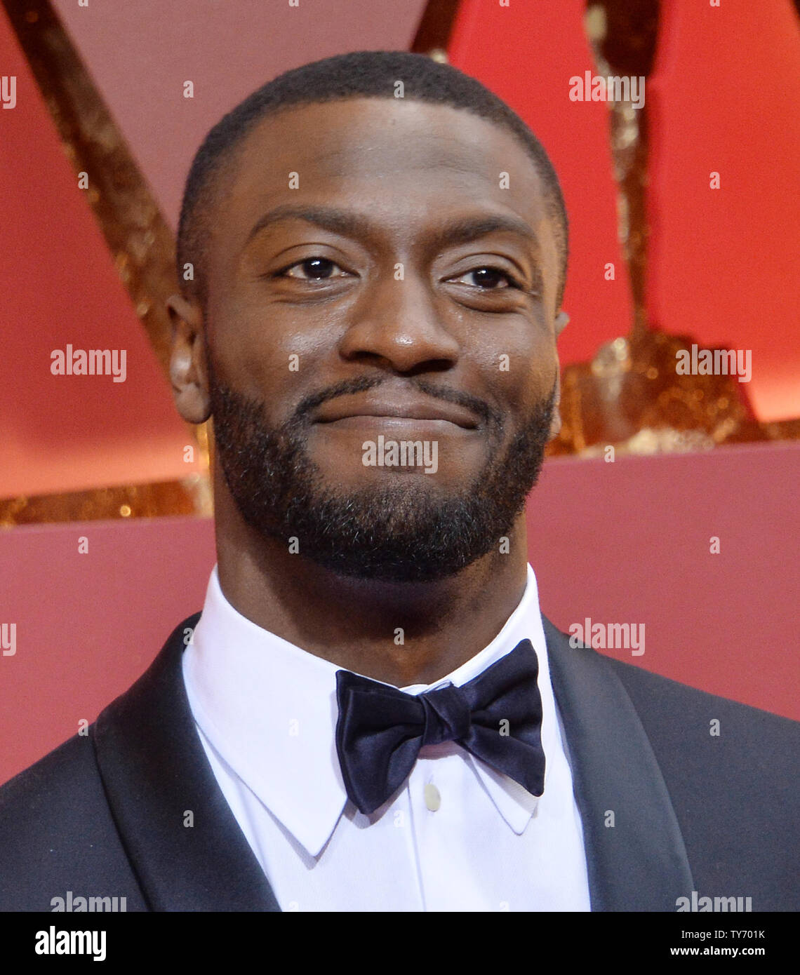 Actor Aldis Hodge arrives on the red carpet for the 89th annual Academy ...