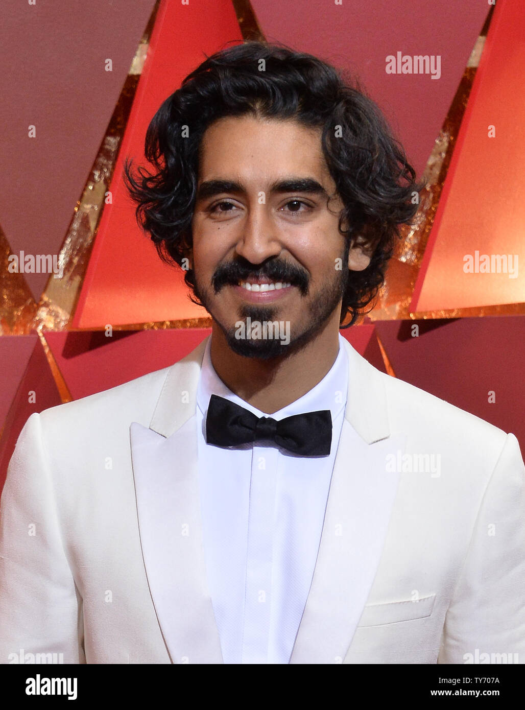 Actor Dev Patel arrives on the red carpet for the 89th annual Academy ...