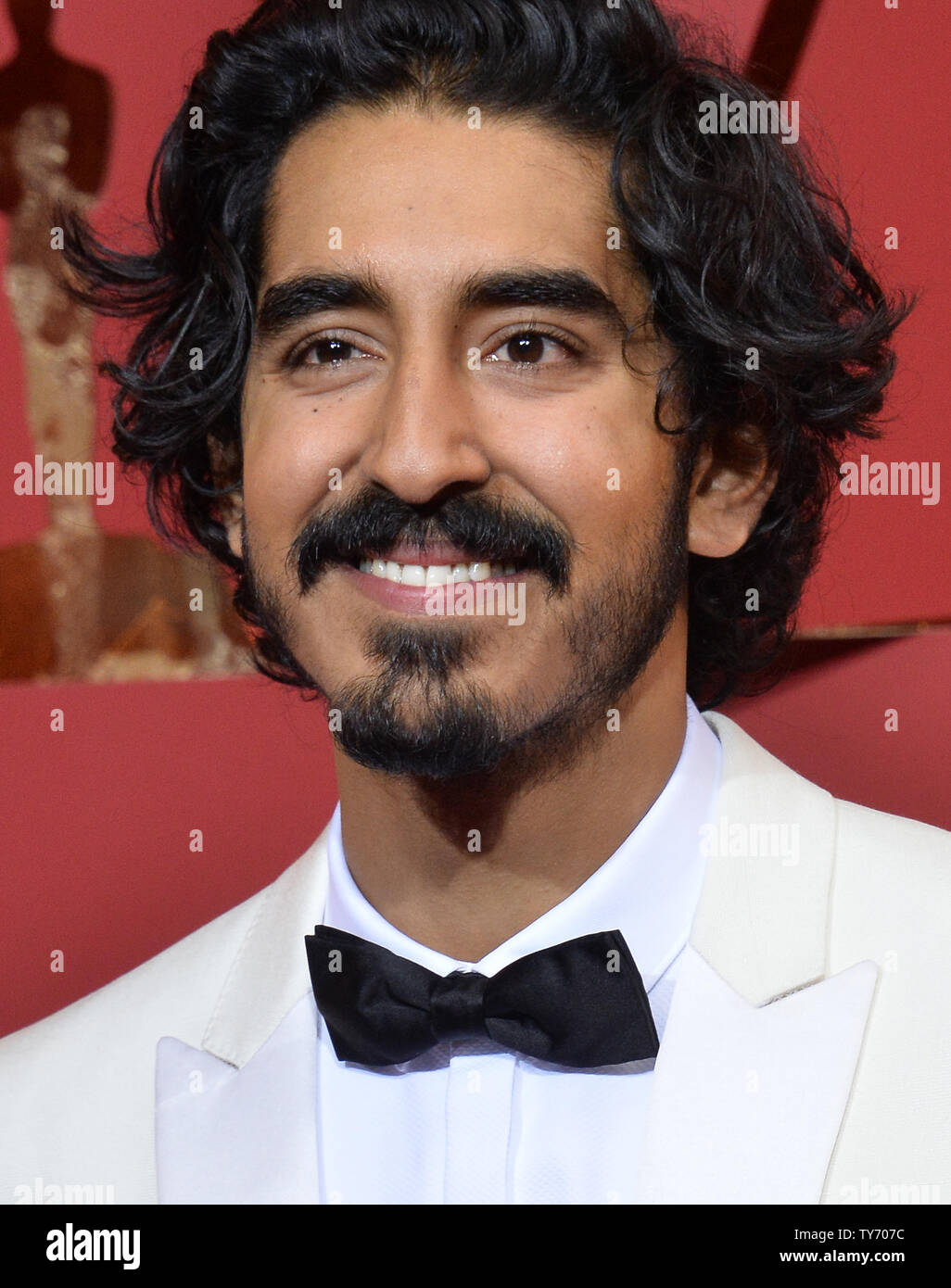 Actor Dev Patel arrives on the red carpet for the 89th annual Academy ...