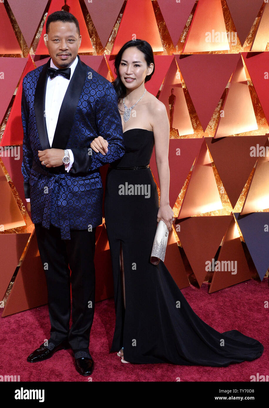 Actor Terrence Howard (L) and Mira Pak arrive on the red carpet for the ...