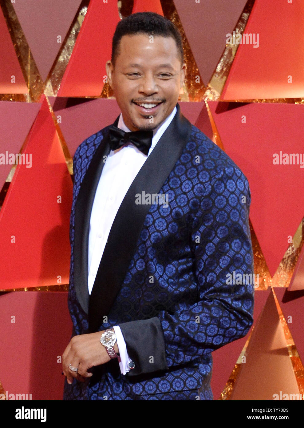 Actor Terrence Howard arrives on the red carpet for the 89th annual ...