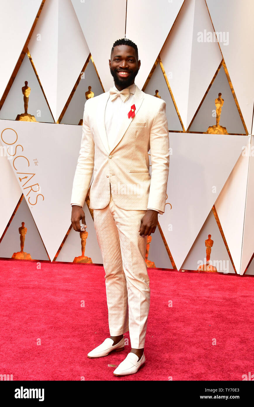 Tarell Alvin McCraney arrives on the red carpet for the 89th annual ...