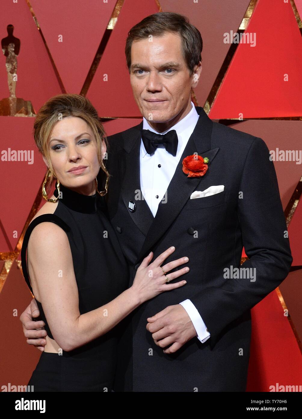 Actors Michael Shannon (R) and Kate Arrington arrive on the red carpet ...