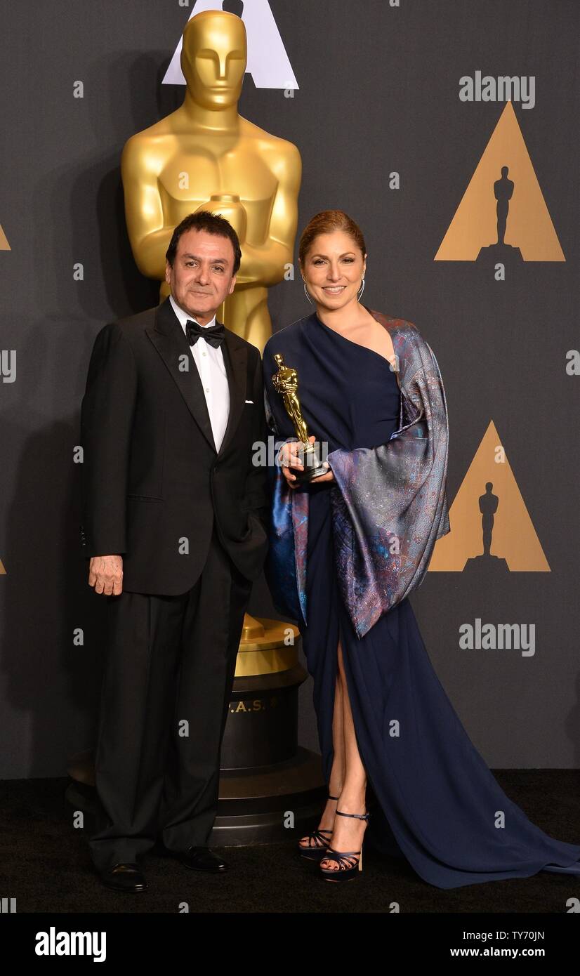 Former NASA scientist Firouz Naderi (L) and engineer/astronaut Anousheh ...