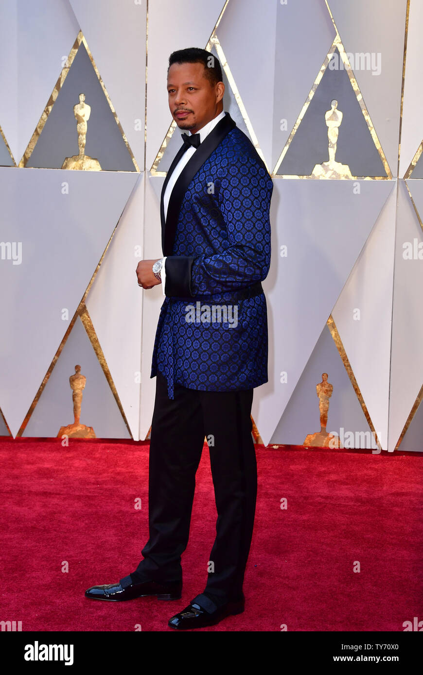 Terrence Howard arrives on the red carpet for the 89th annual Academy ...