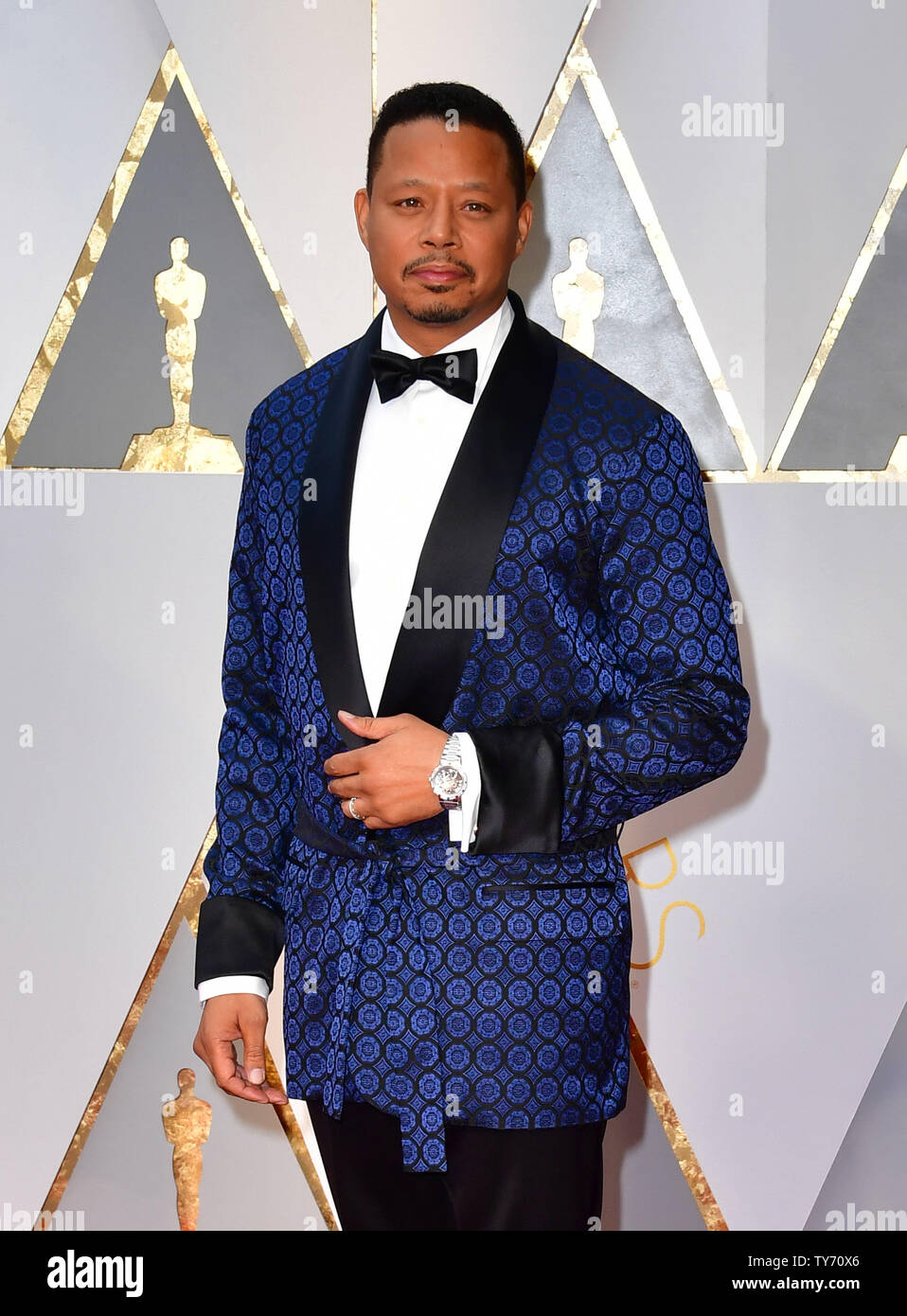 Terrence Howard arrives on the red carpet for the 89th annual Academy ...