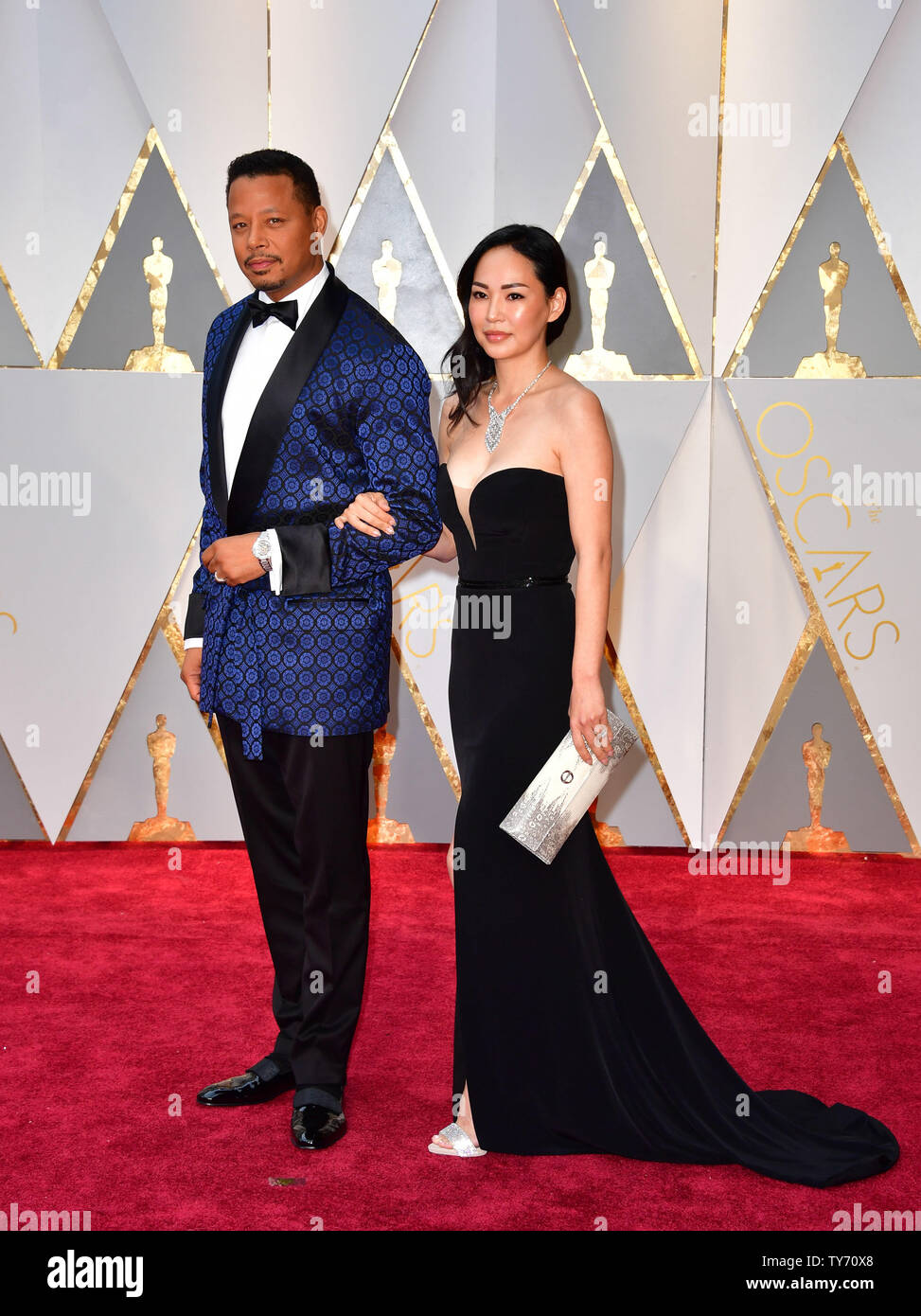 Terrence Howard and Mira Pak arrive on the red carpet for the 89th ...
