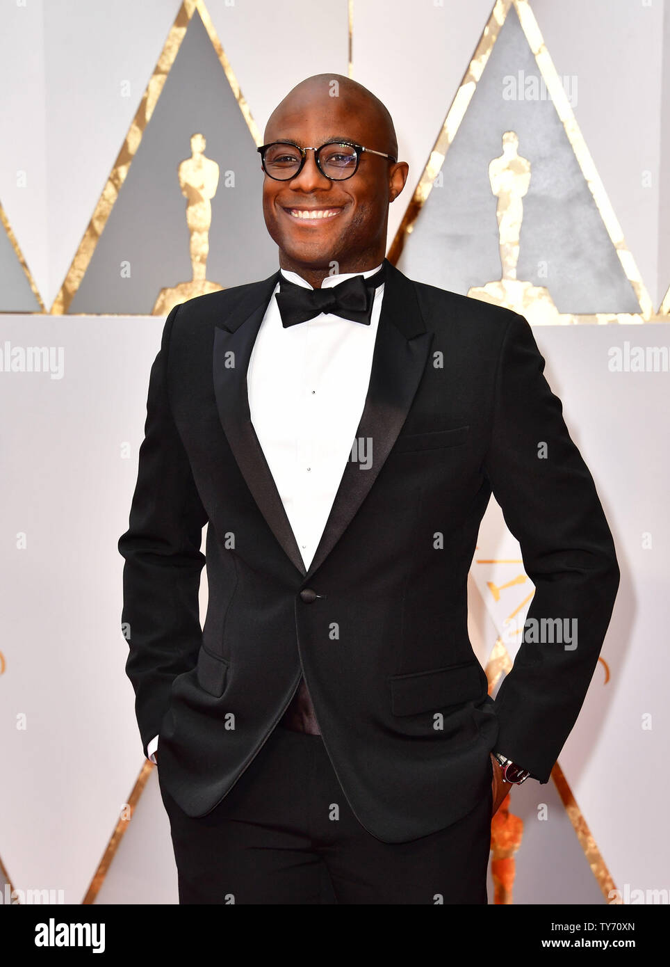 Director Barry Jenkins arrives on the red carpet for the 89th annual ...