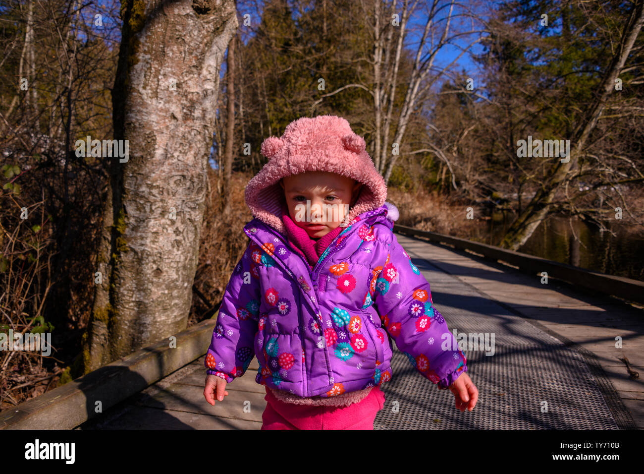 20 months old baby enjoying the nice weather outside. Toddler girl ...