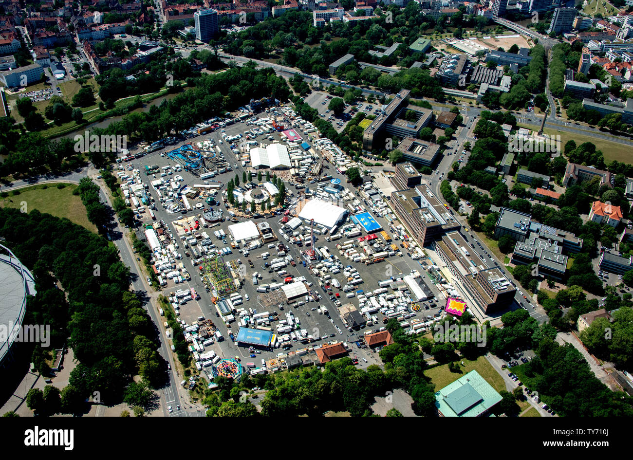 Hanover, Germany. 25th June, 2019. Fairground rides, marquees and ...