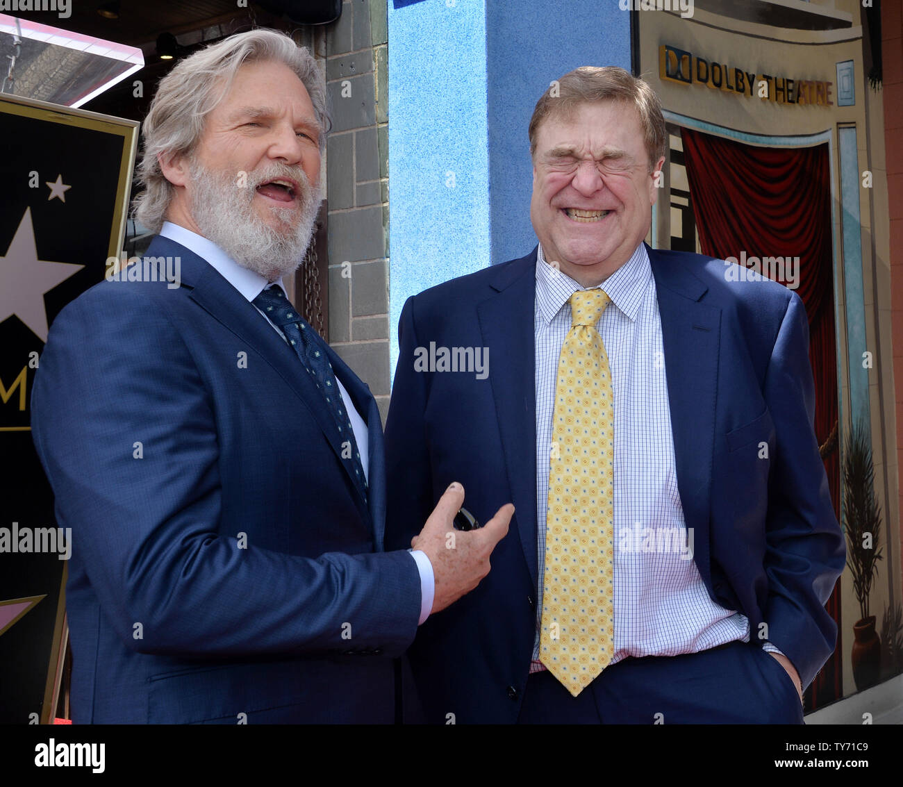 Actor John Goodman (R) shares a laugh with actor Jeff Bridges during an ...