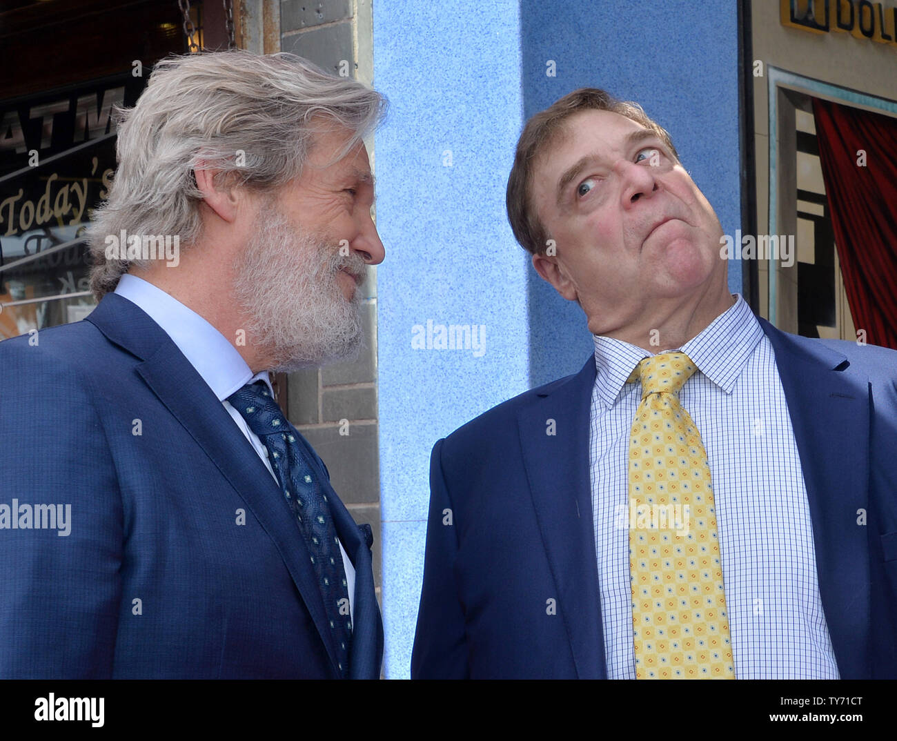 Actor John Goodman (R) shares a laugh with actor Jeff Bridges during an ...