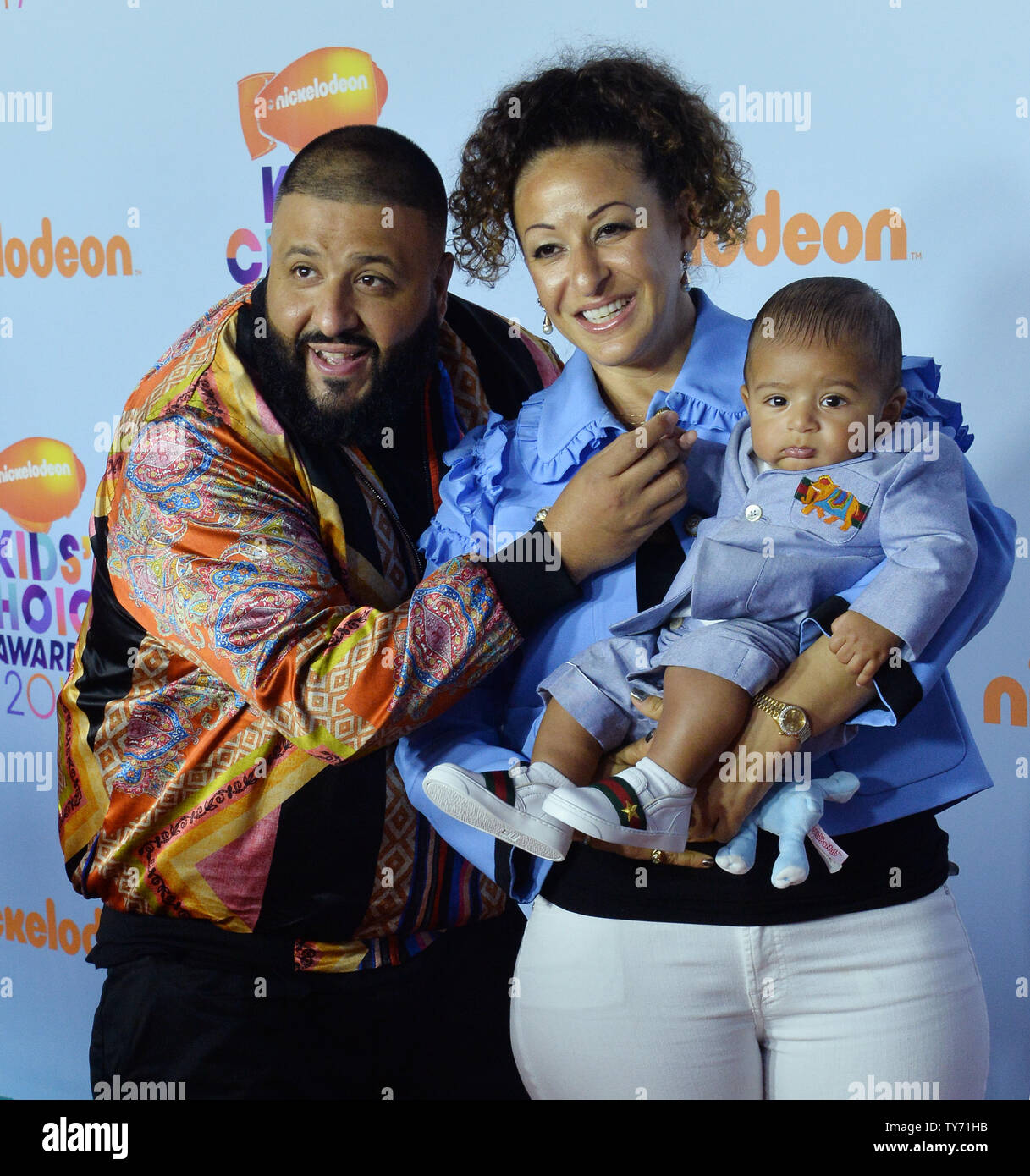 DJ Khaled (L) with Nicole Tuck and their son Asahd Tuck Khaled attend ...
