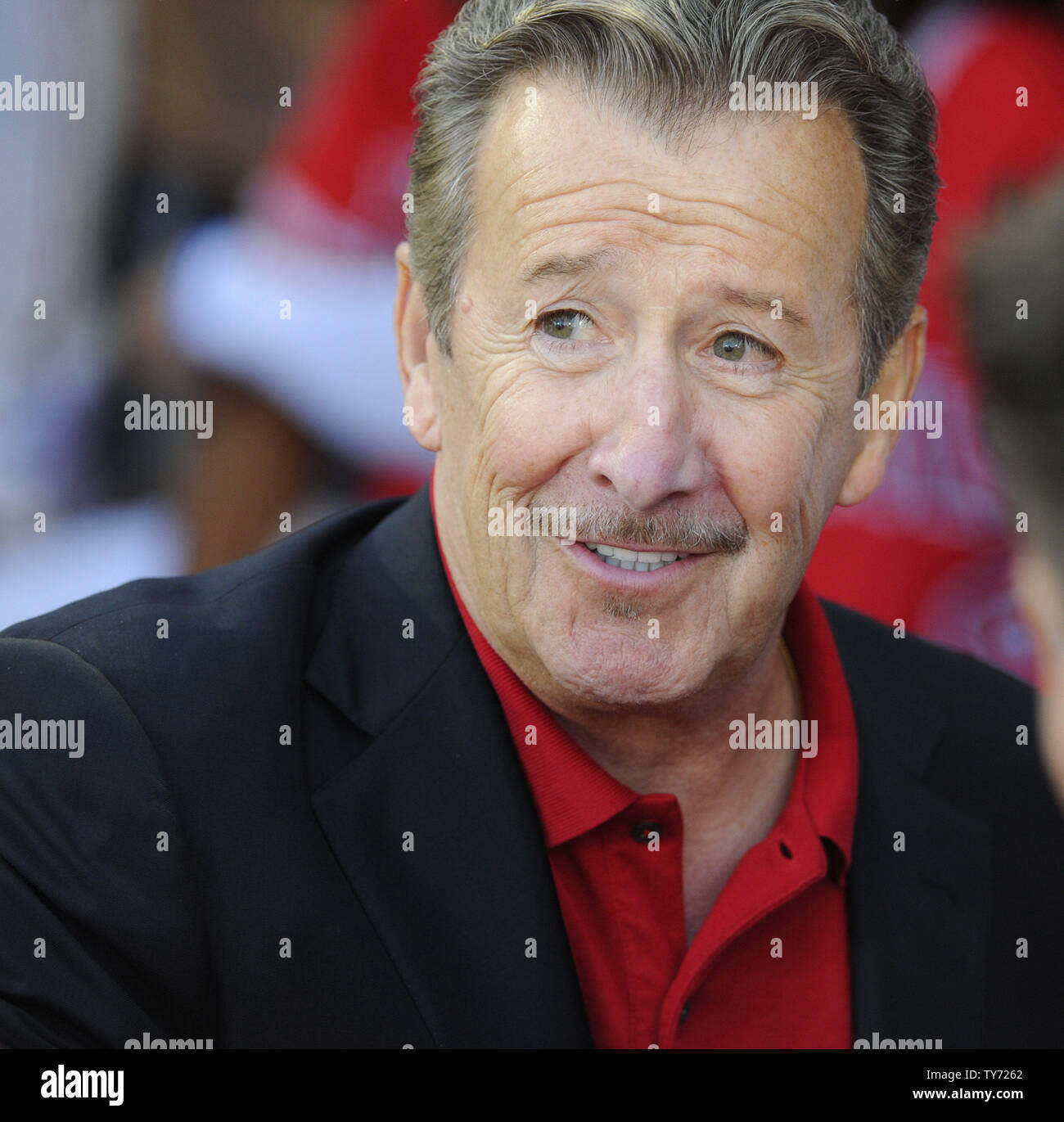 Los Angeles Angels' owner Artie Moreno greets the players before the ...