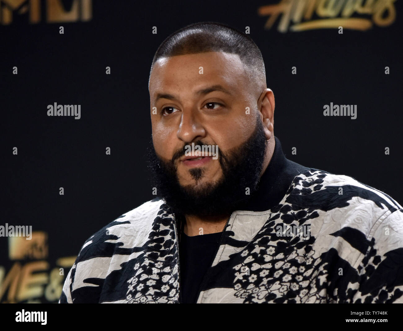 Producer DJ Khaled attends the MTV Movie & TV Awards in the rain at the ...