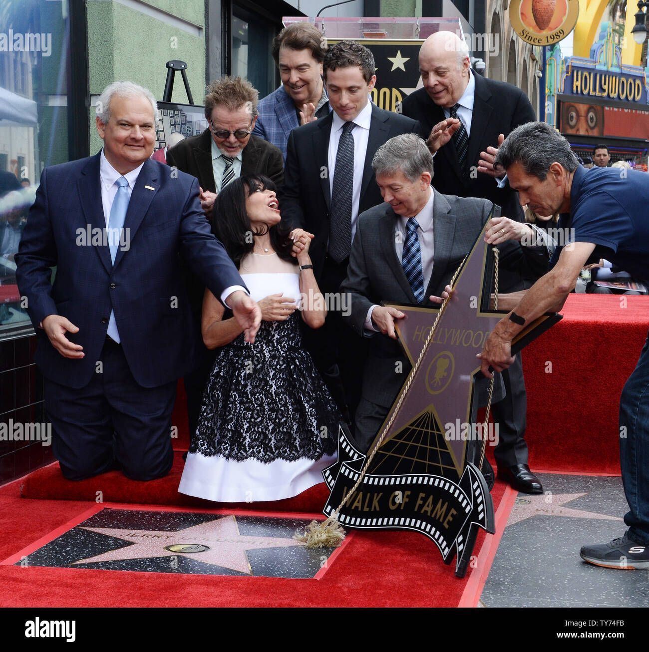 Carol Goldsmith (L) and Aaron Goldsmith, the wife and son of Oscar ...