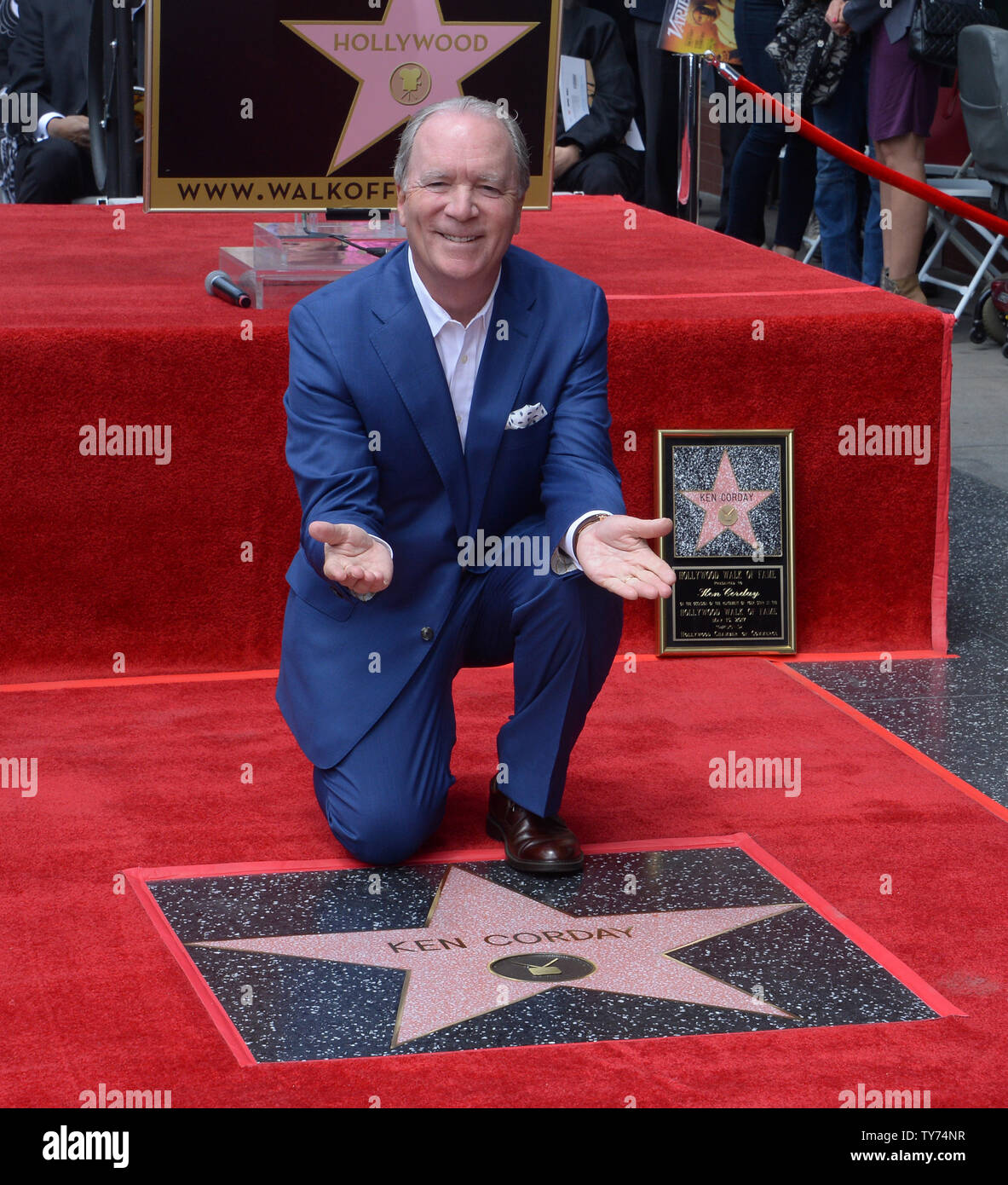 "Days of Our Lives" producer Ken Corday kneels beside his star during ...