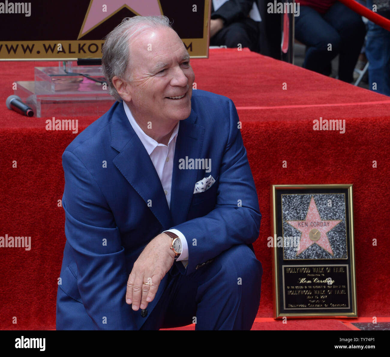 "Days of Our Lives" producer Ken Corday kneels beside his star during ...