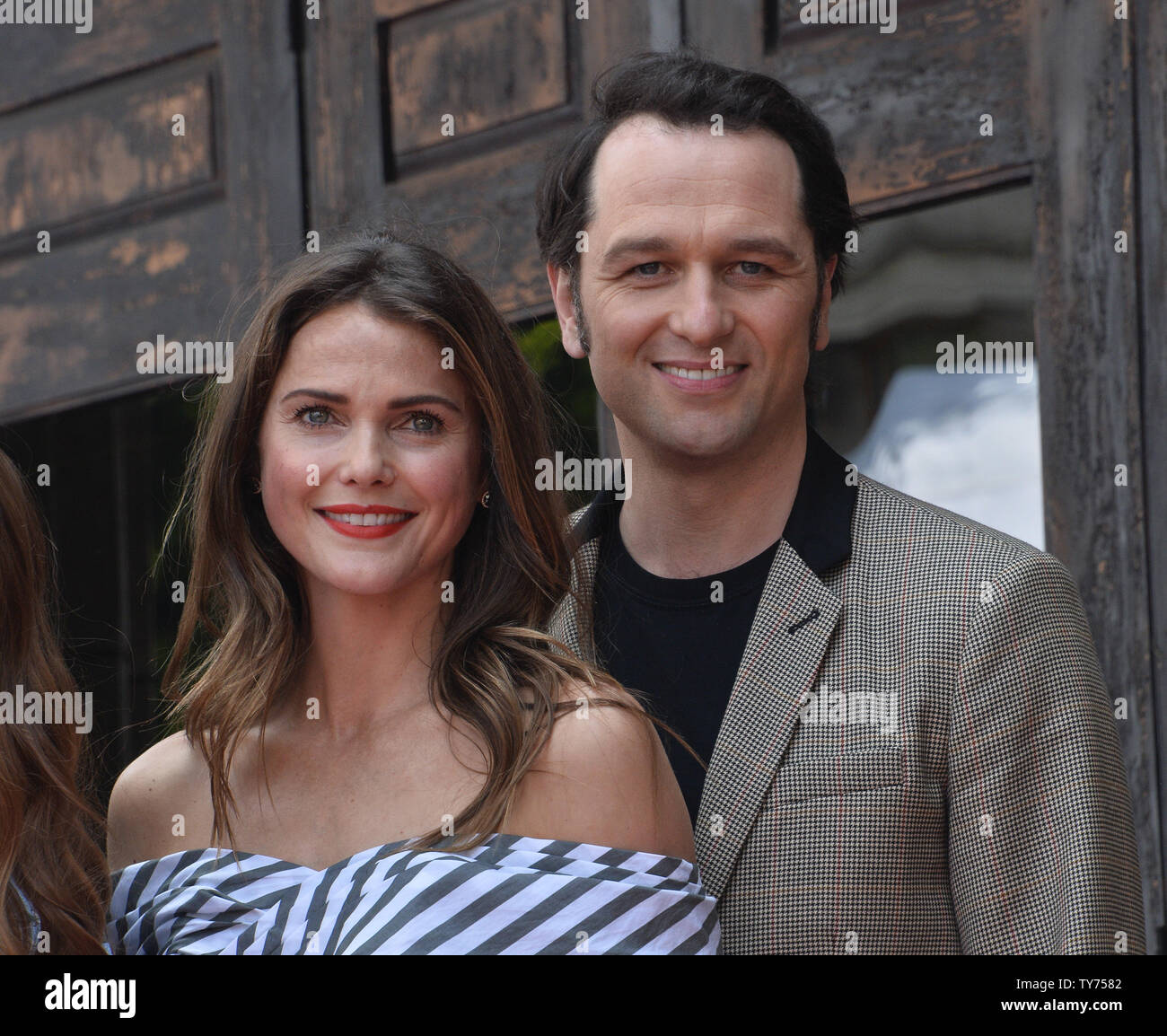 Actress Keri Russell is joined by her boyfriend, actor Matthew Rhys ...