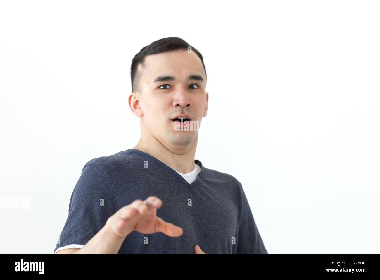 Negative emotions and people concept - asian man scared something on ...