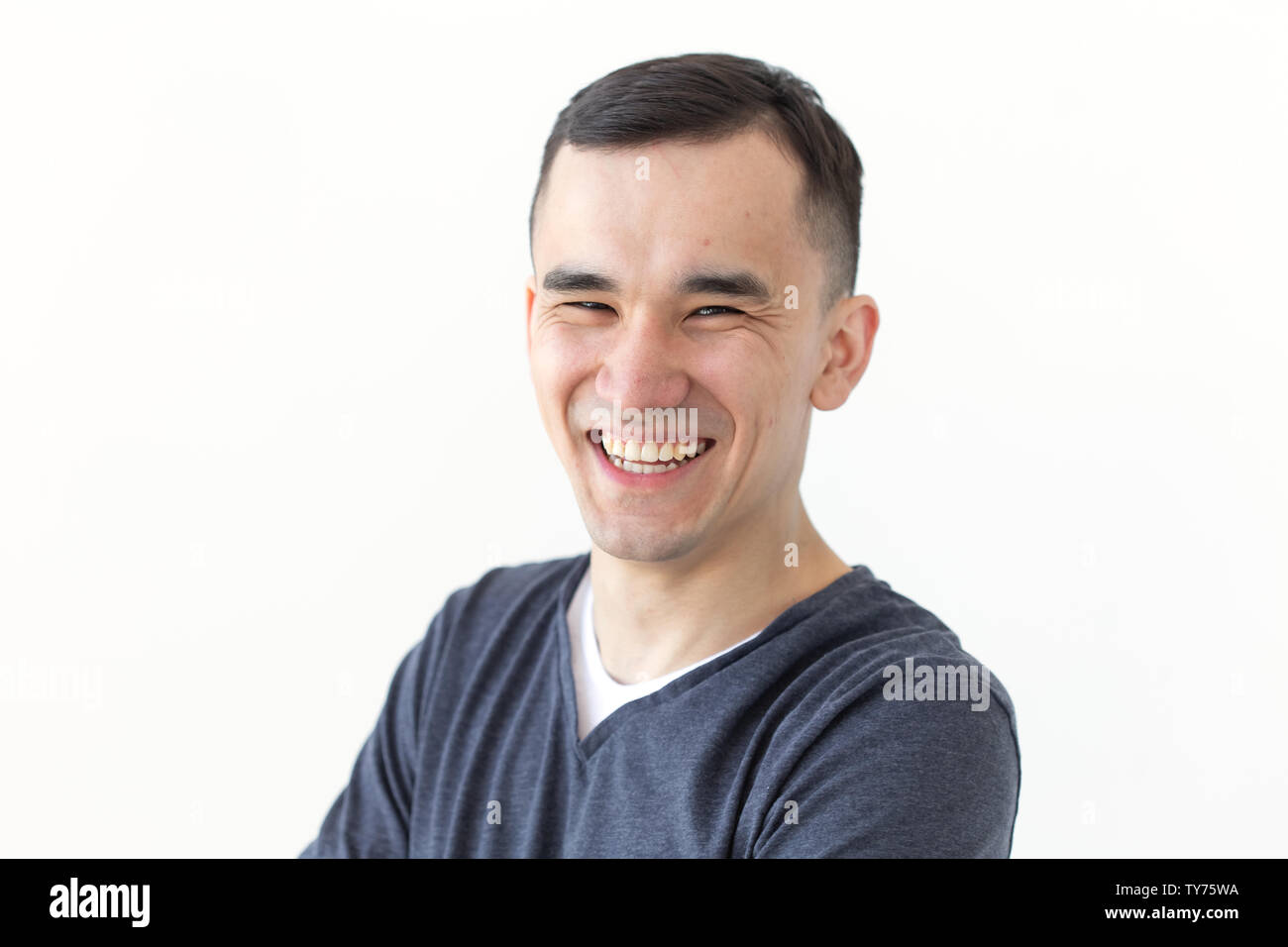 Expression and gesture concept - Portrait of laughing asian man on ...